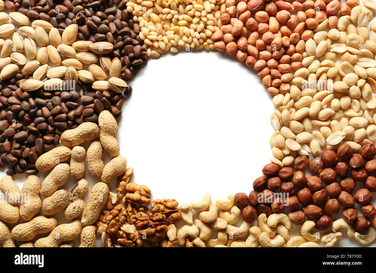 Frame made of different nuts on white background Stock Photo - Alamy