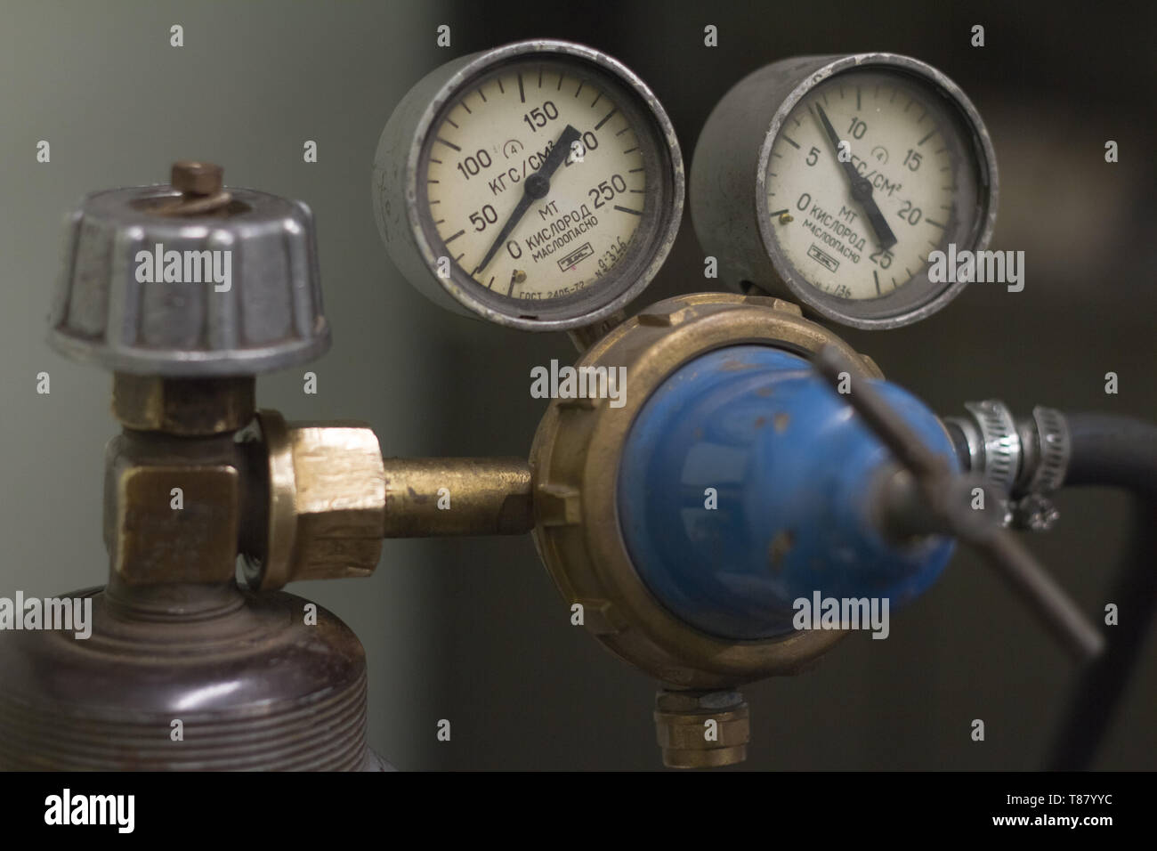 Close-up of a pressure sensors on an oxygen cylinder with inscriptions ...