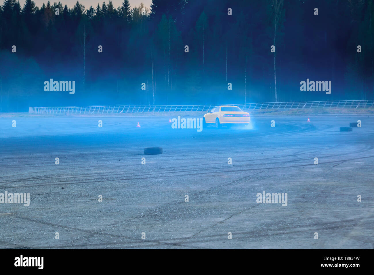Blurred of image diffusion race drift car with lots of smoke from ...