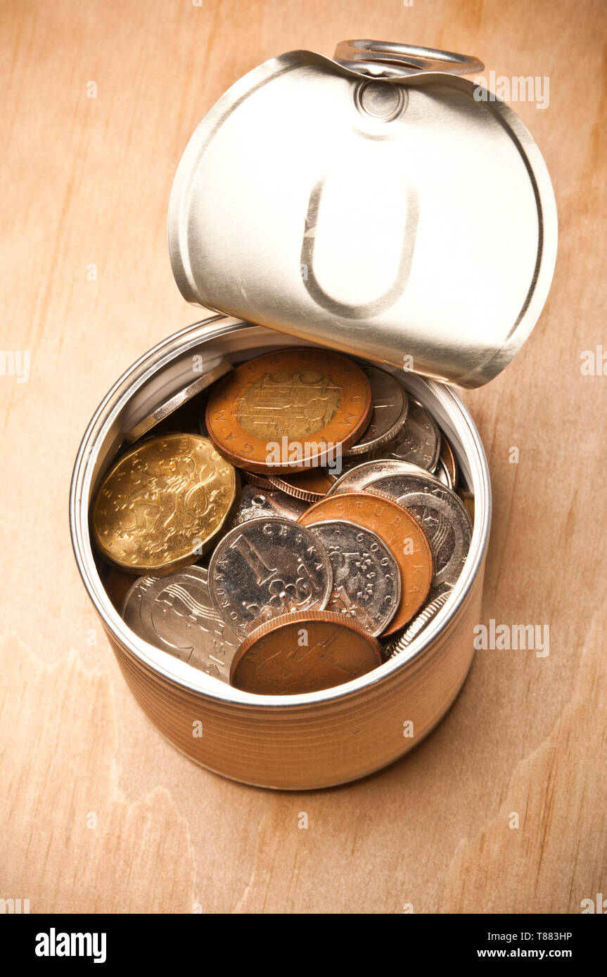 Savings can hi-res stock photography and images - Alamy