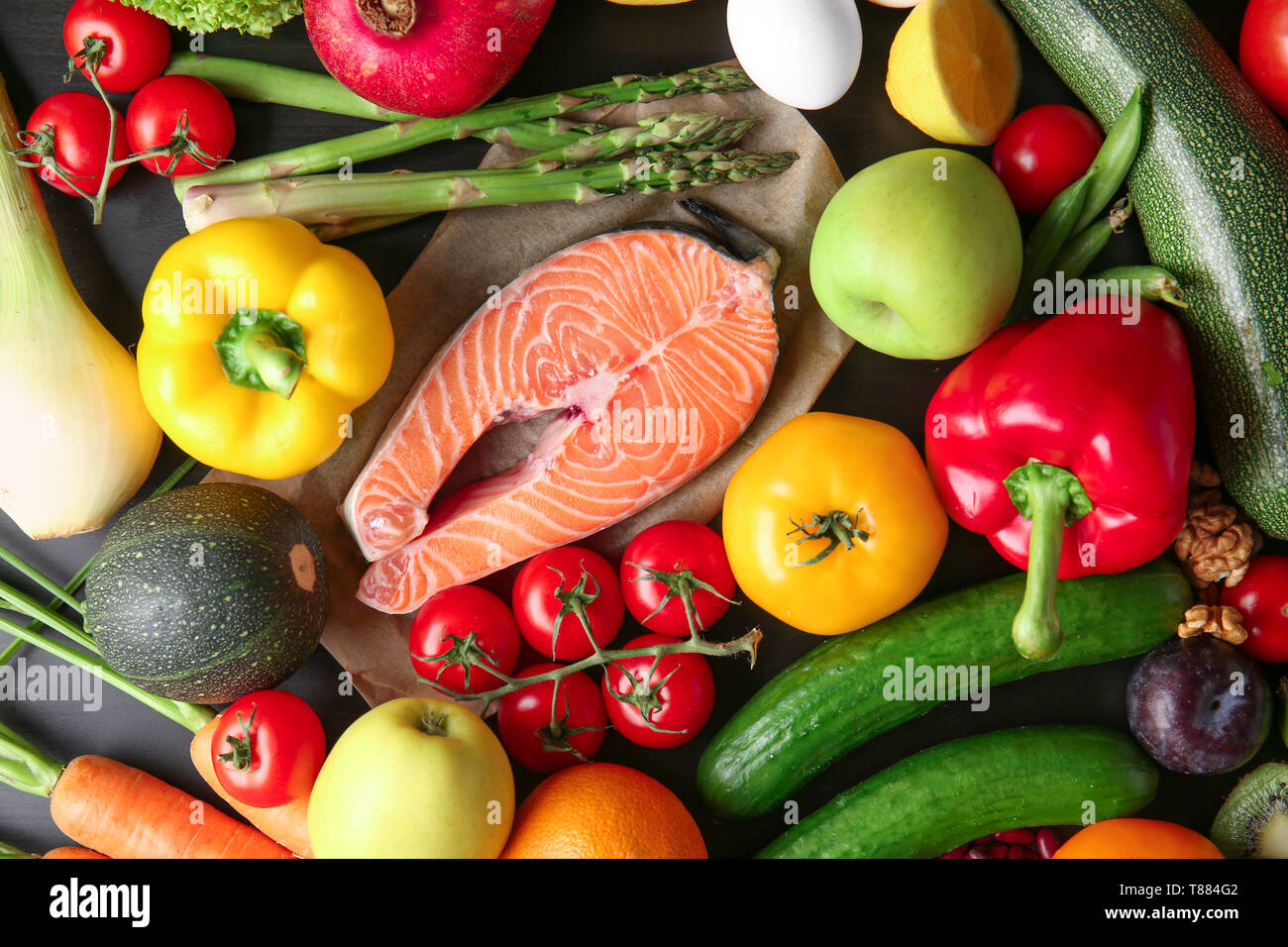 Various healthy products on dark background Stock Photo - Alamy