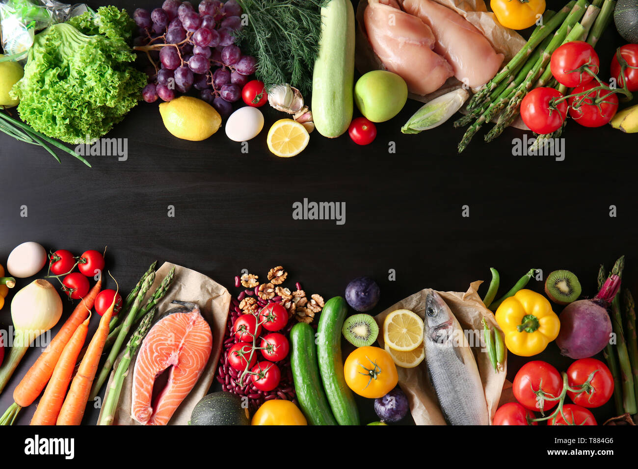 Various healthy products on dark background Stock Photo - Alamy