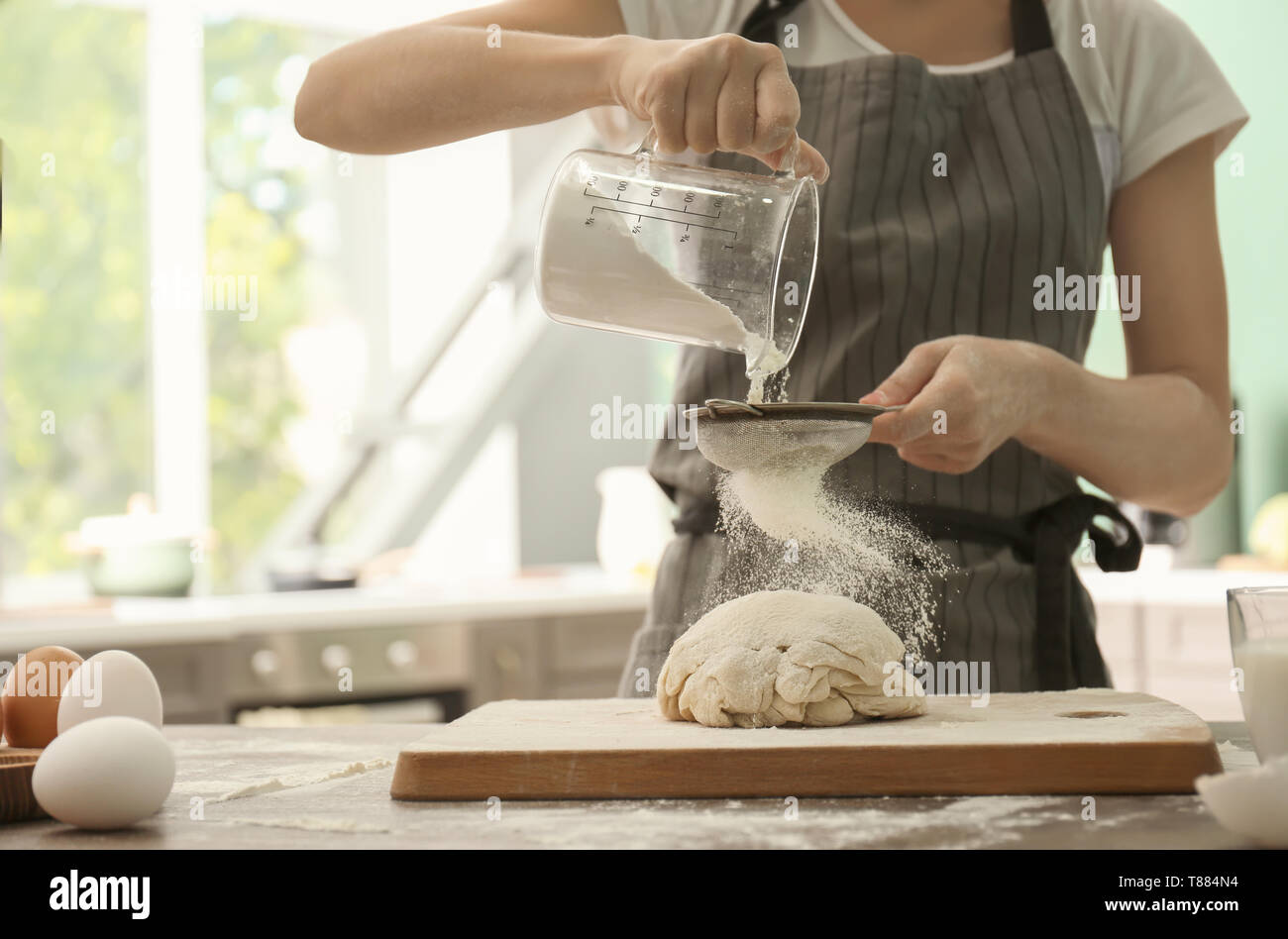 Woman measuring flour fresh bread hi-res stock photography and images ...