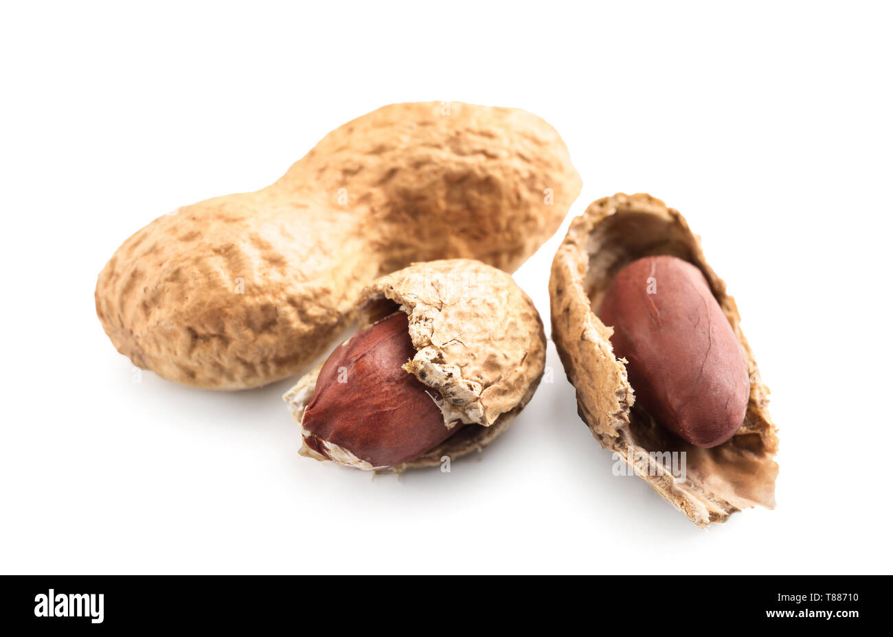 Tasty peanuts on white background Stock Photo - Alamy