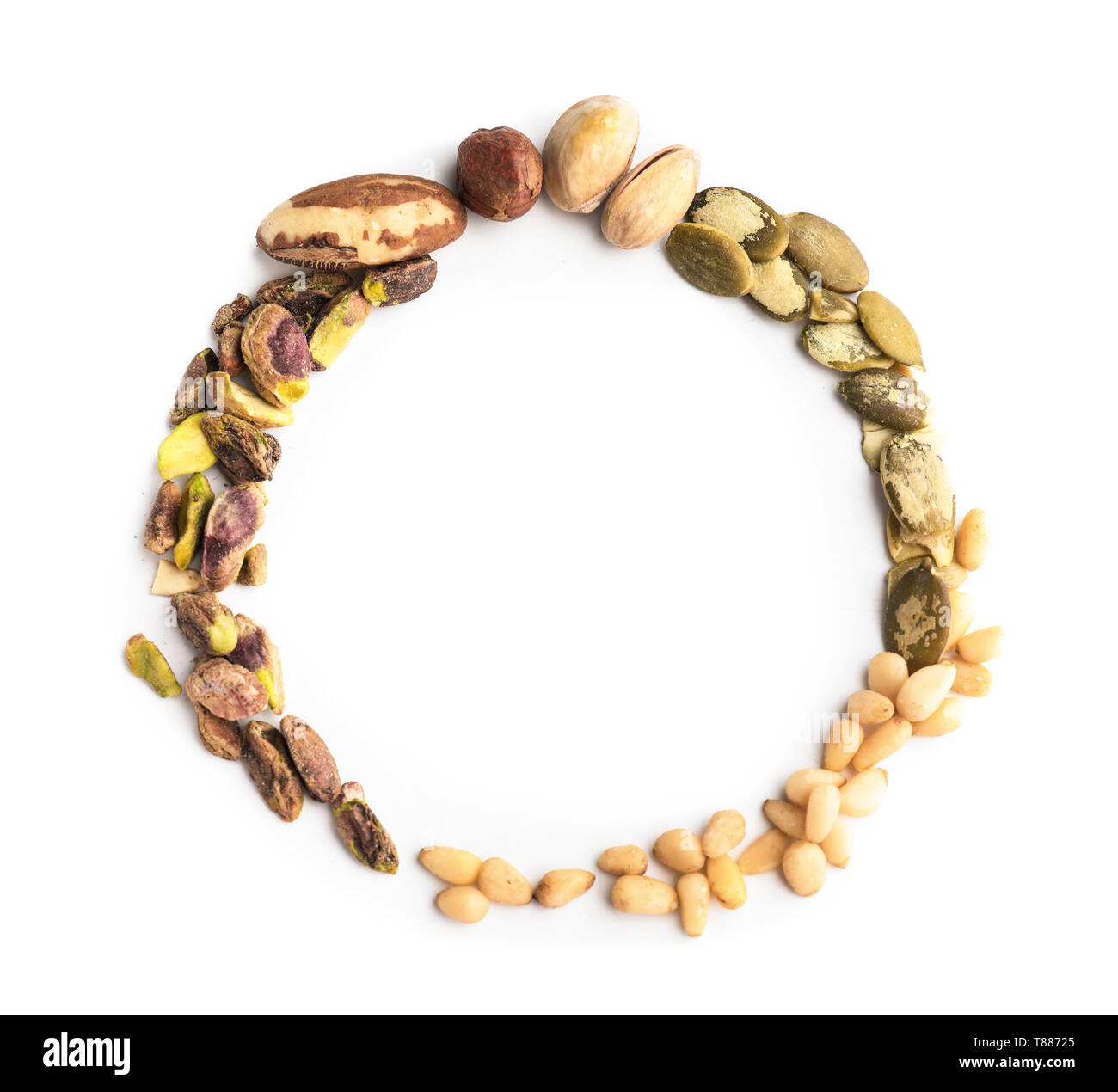 Circle made of different nuts on white background Stock Photo - Alamy