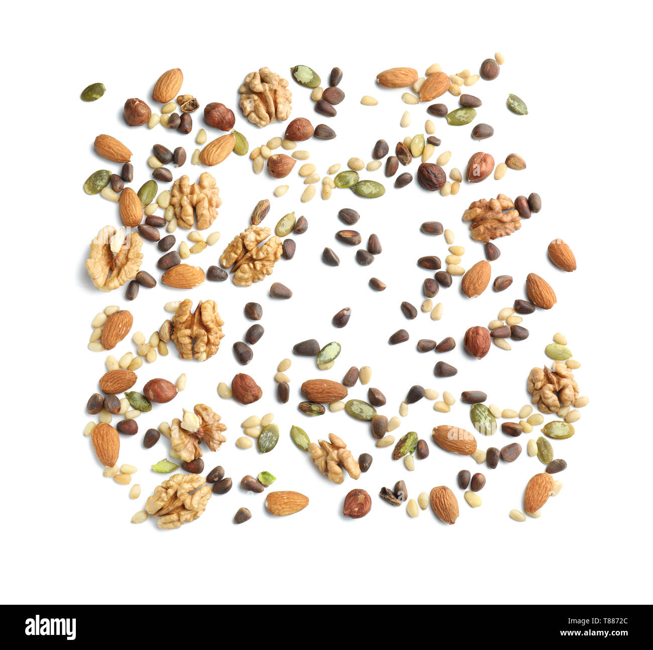 Different nuts on white background Stock Photo - Alamy