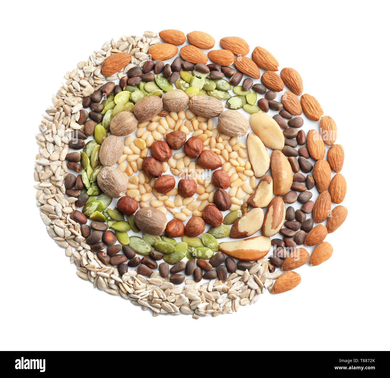 Composition with different nuts on white background Stock Photo - Alamy