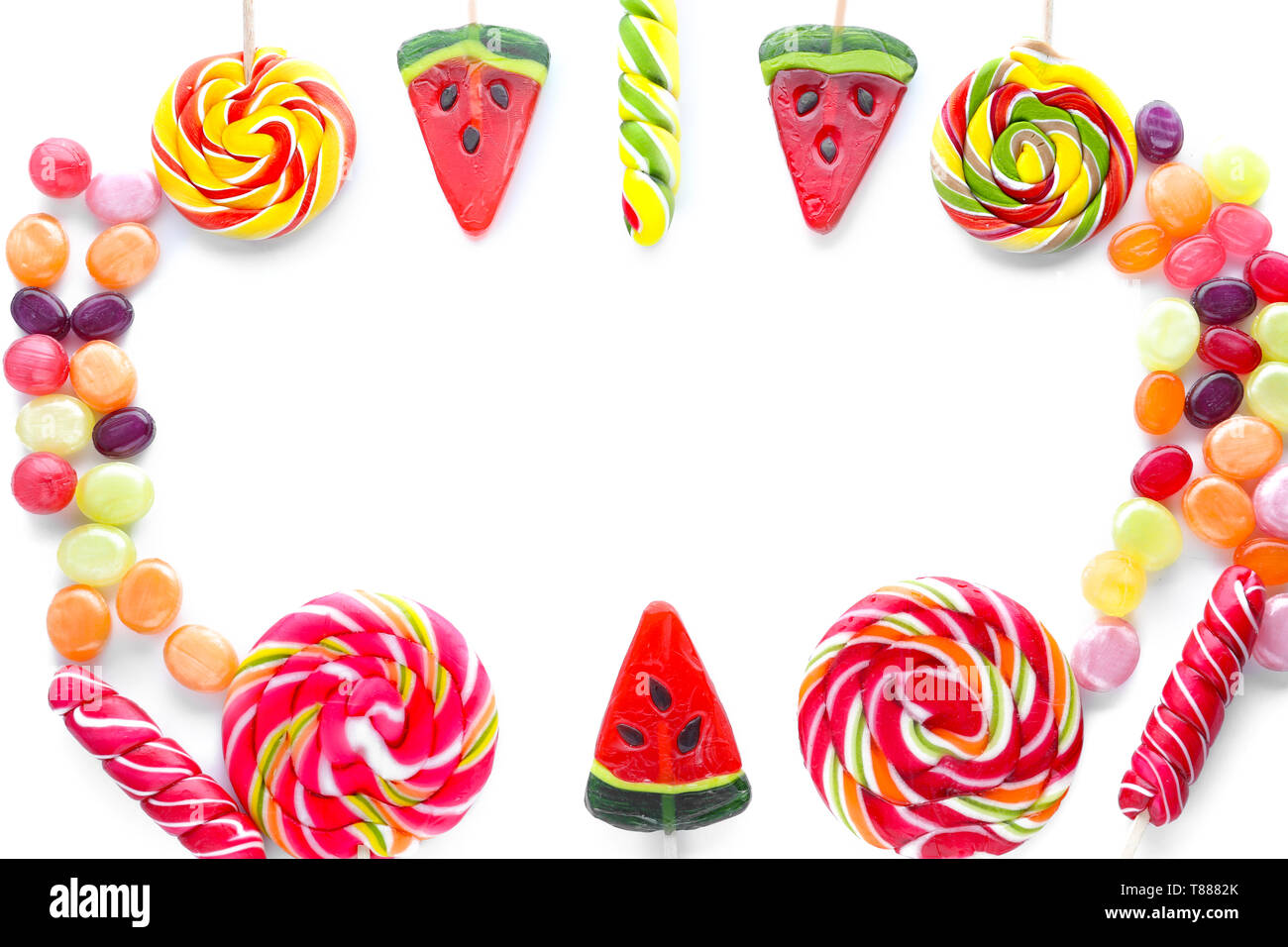 Frame made of colorful candies on white background Stock Photo - Alamy
