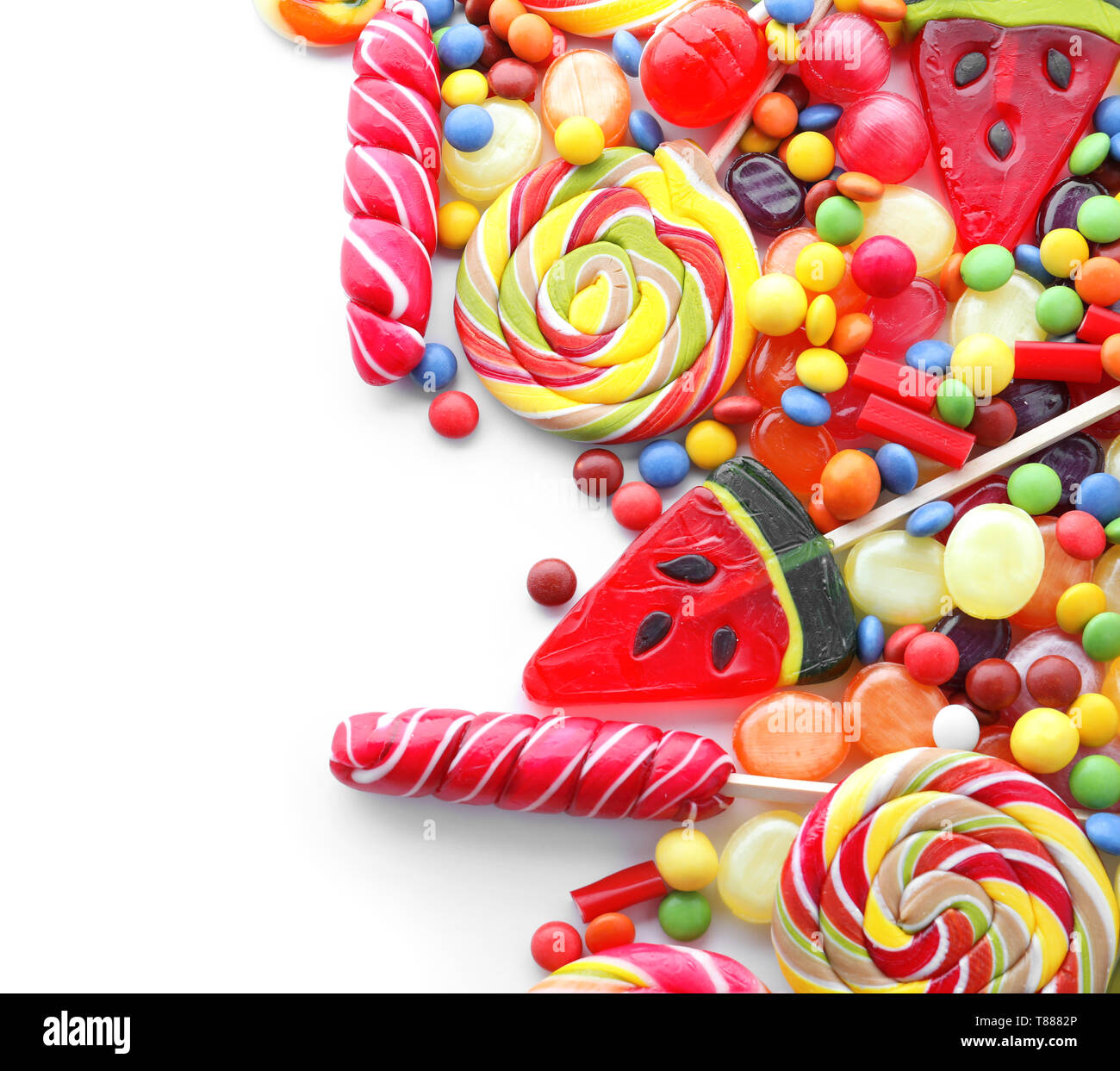 Colorful candies on white background Stock Photo - Alamy