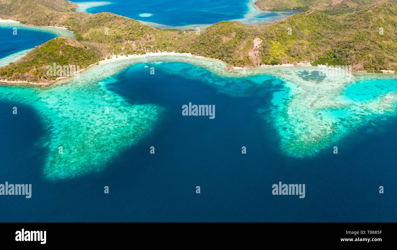aerial seascape Lagoons with blue, azure water in middle of small ...