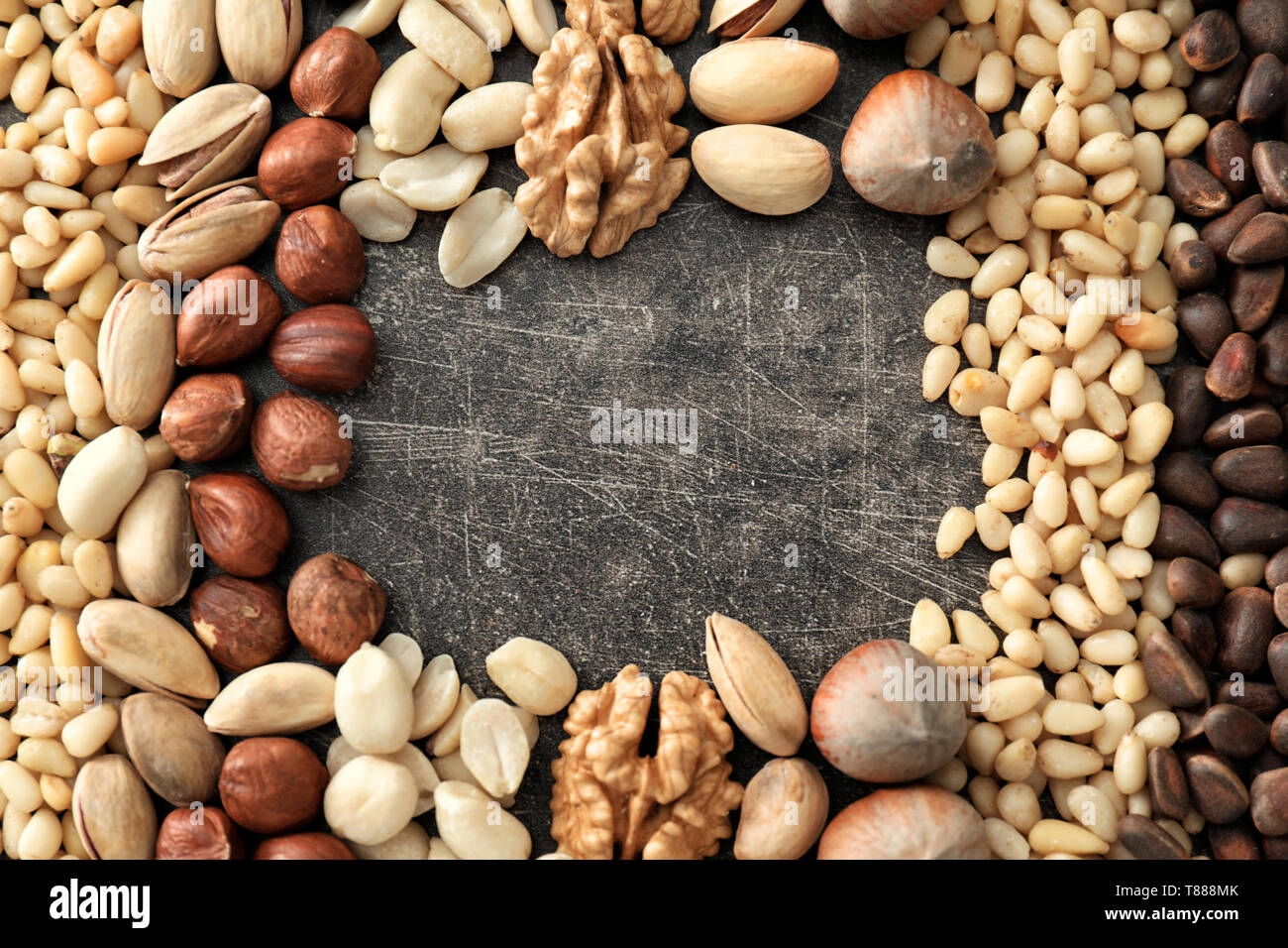 Frame made of different nuts on grey background Stock Photo - Alamy