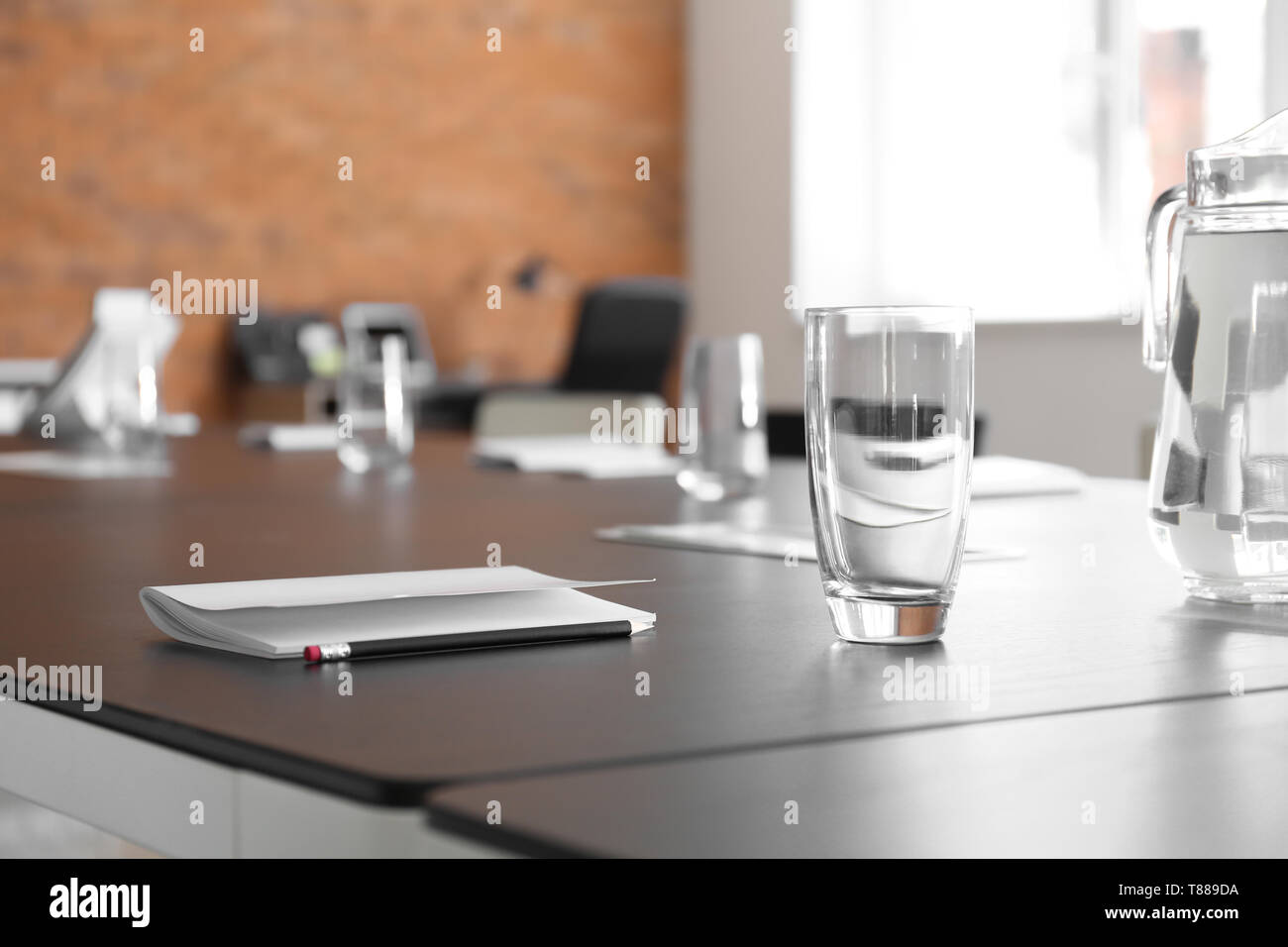 Table prepared for business meeting in conference hall Stock Photo - Alamy