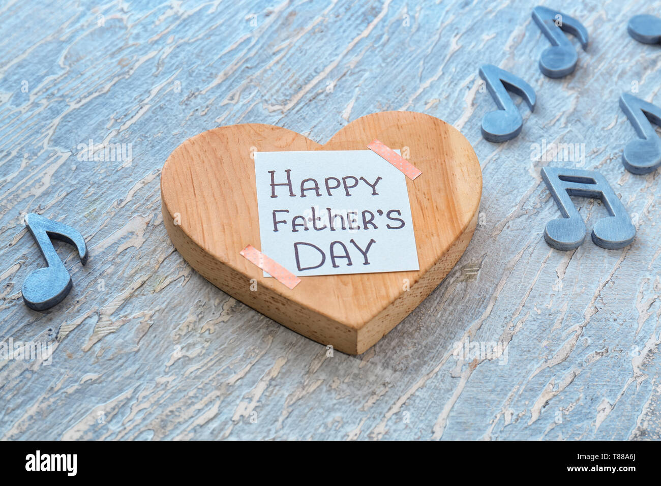 Heart with words HAPPY FATHERS DAY on wooden background Stock Photo - Alamy