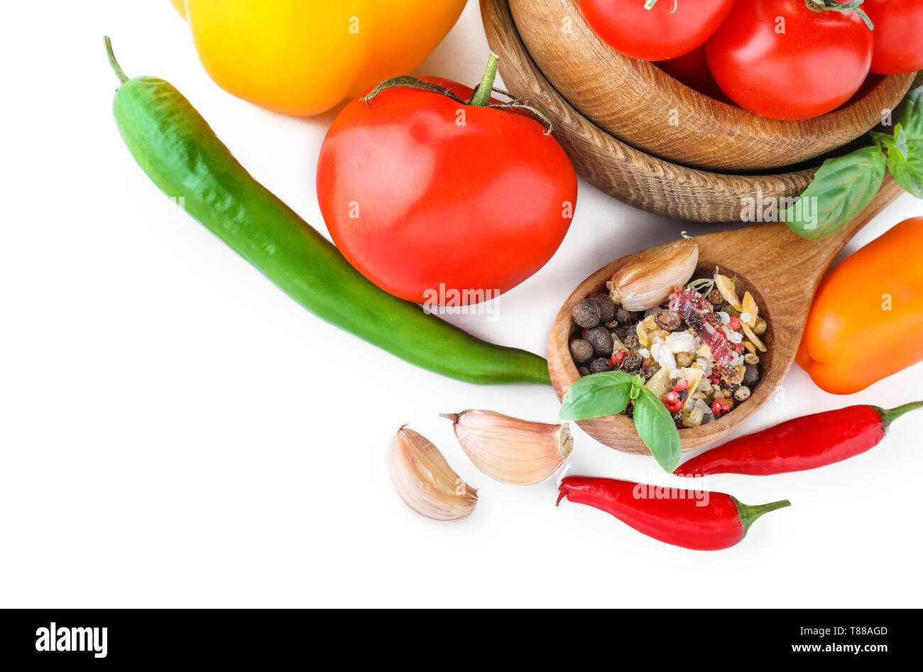 Fresh vegetables with spices on white background Stock Photo - Alamy