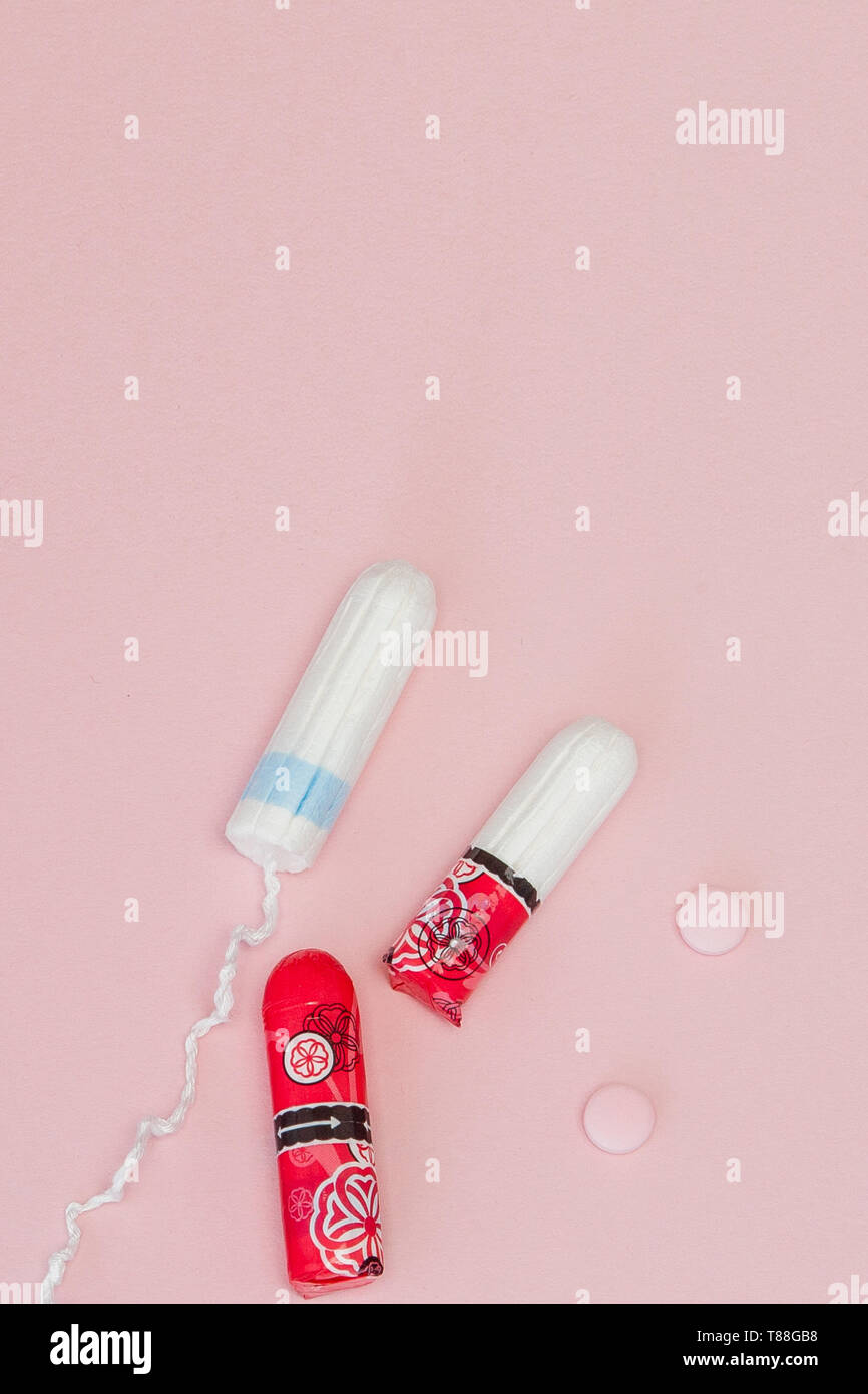 Menstrual period concept. Woman hygiene protection. Cotton tampons on ...