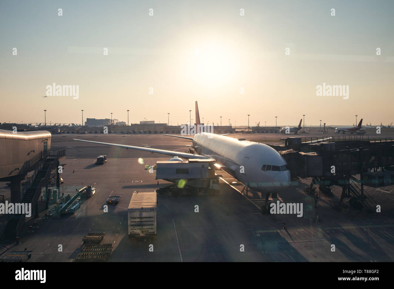 plane parked in the airport Stock Photo - Alamy