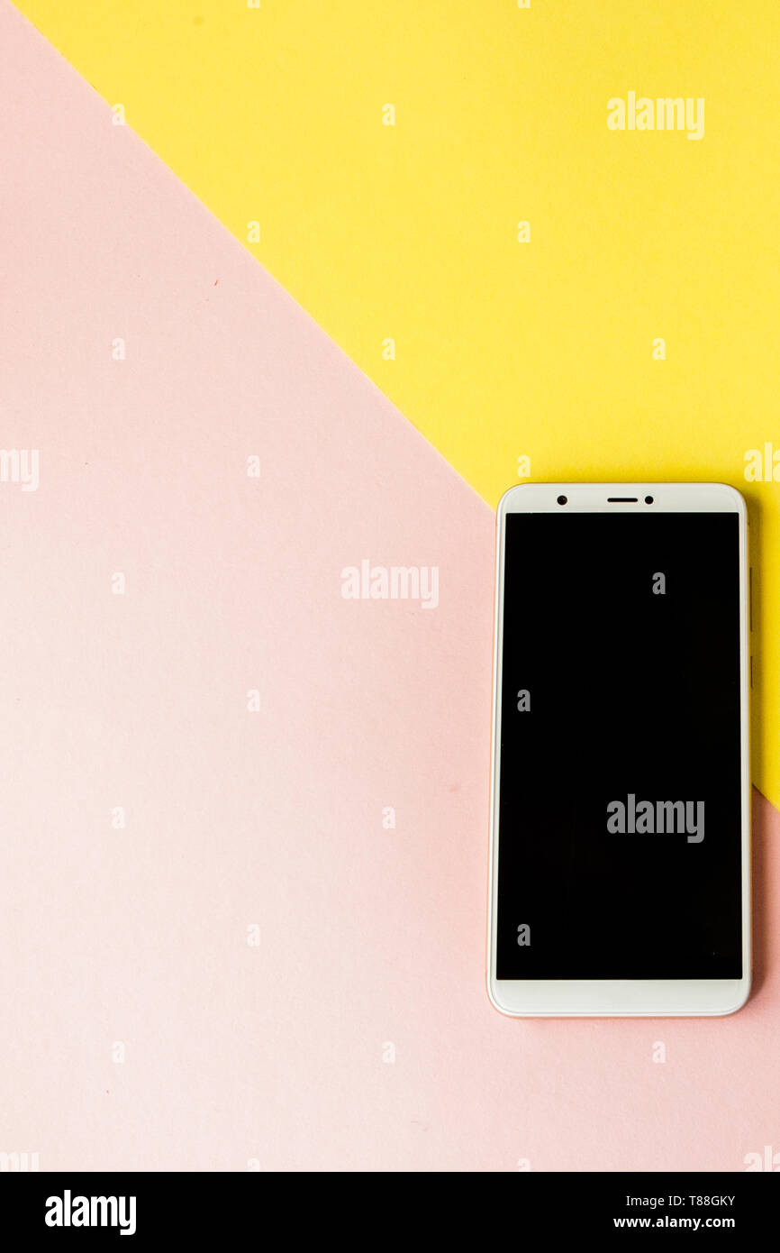smart phone screen on colored background. Minimal concept. Flat lay ...