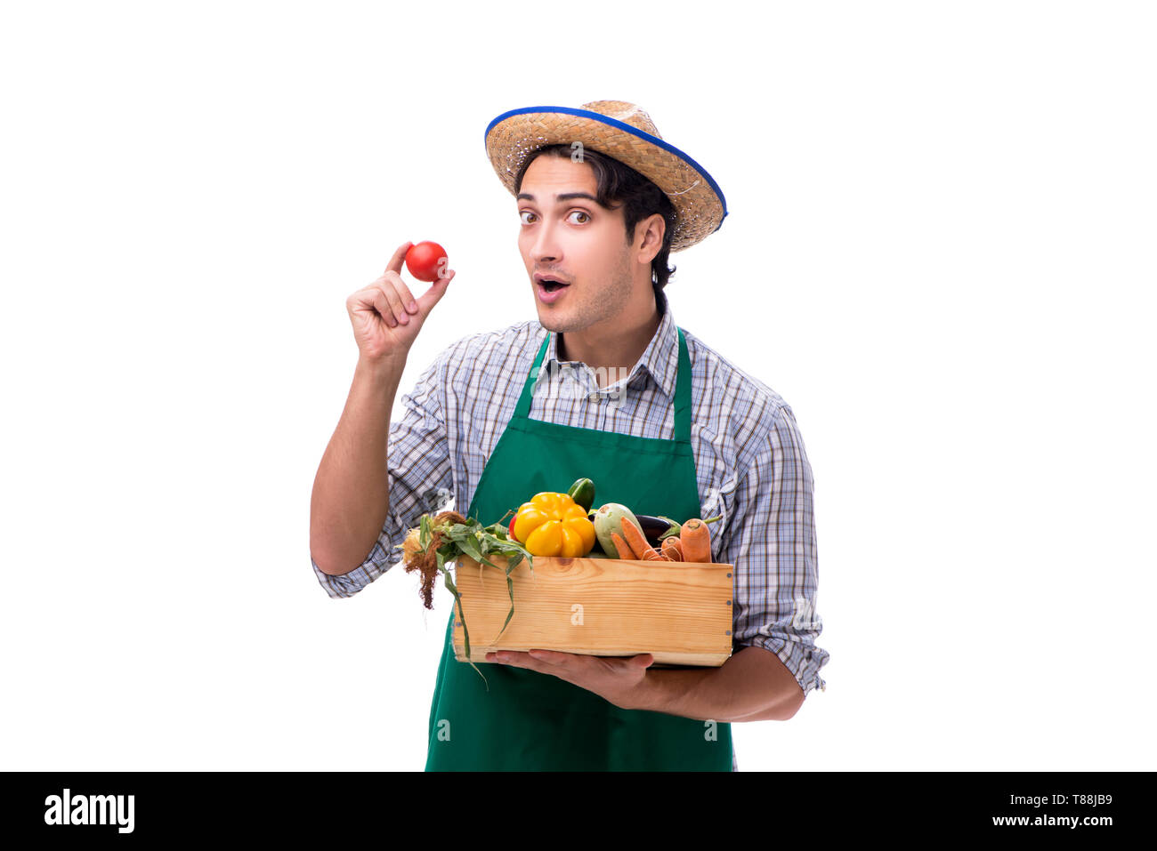 Young farmer with fresh produce isolated on white background Stock ...