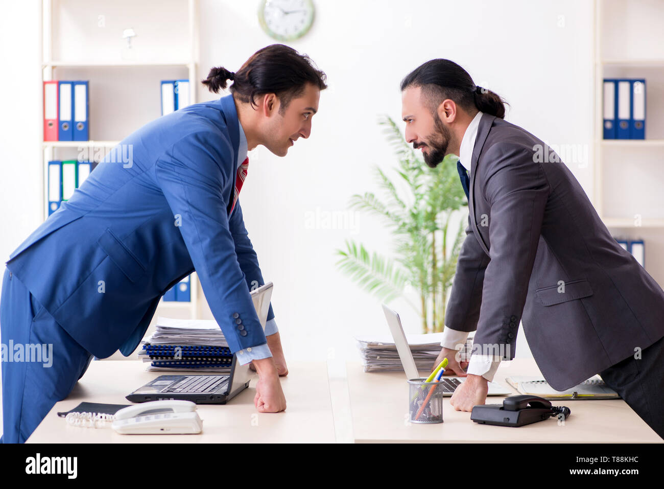 Two male colleagues in the office Stock Photo - Alamy