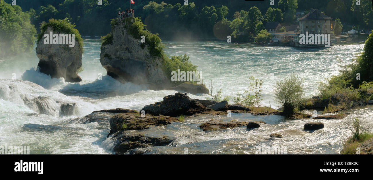 Tourist-infested islands in the torrent of the Rhine falls at ...