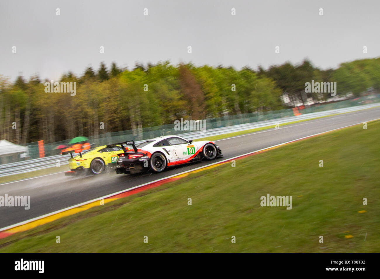 Porsche and Aston Martin Vantage go head-to-head into Les Combes. WEC ...
