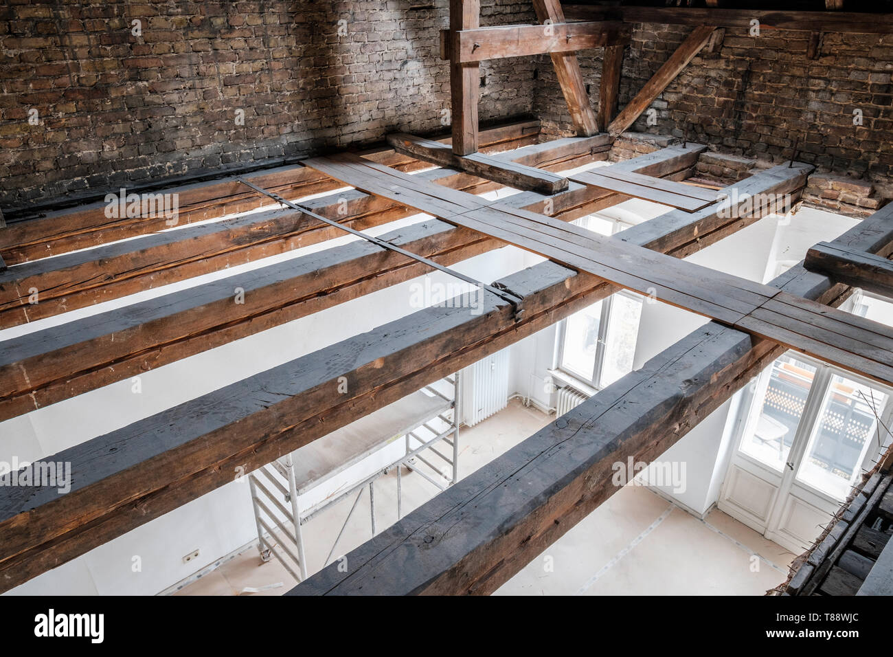 floor beams in attic / loft during renovation, roof under construction ...