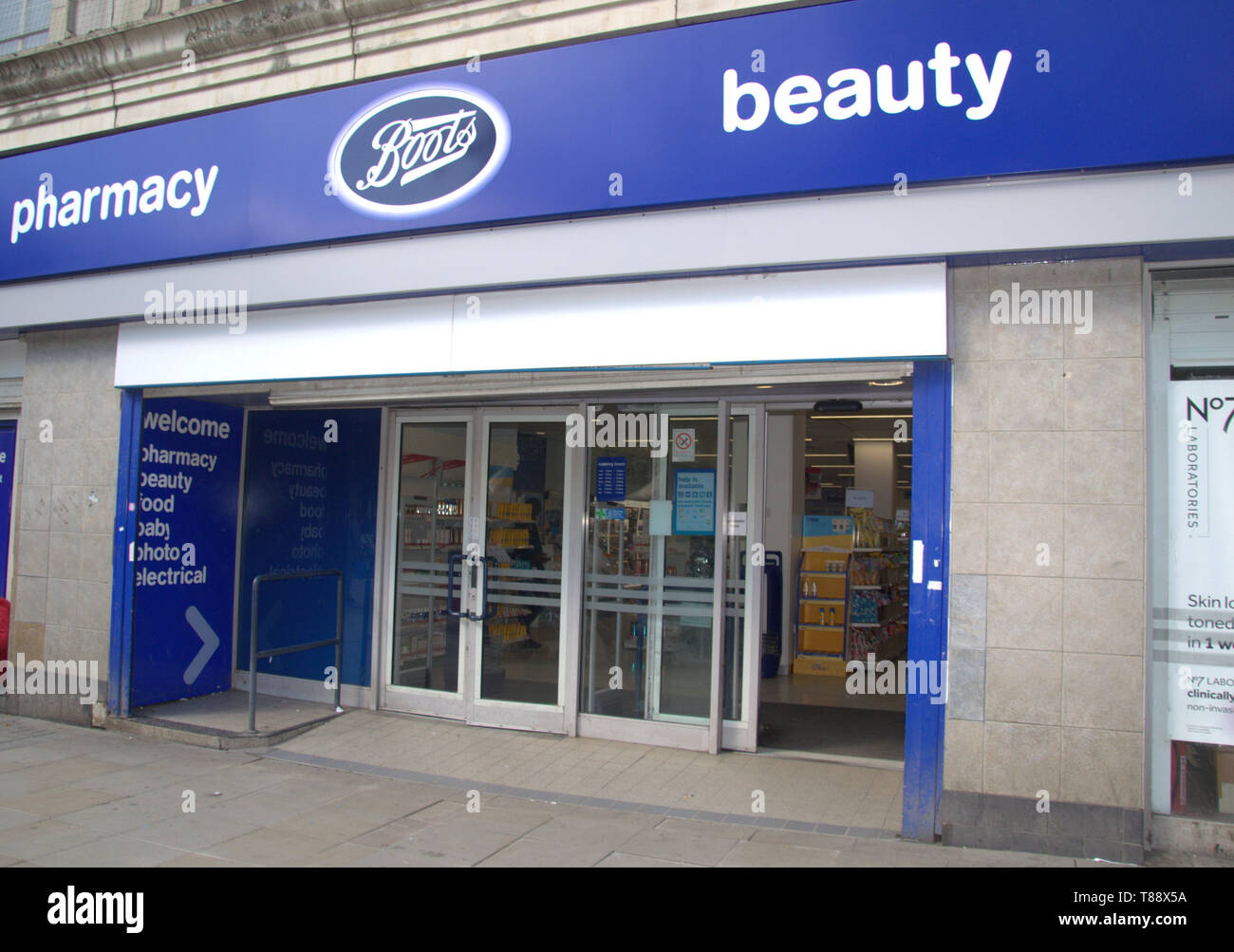 Exterior view of Boots shop in Piccadilly Gardens, Manchester, uk Stock ...