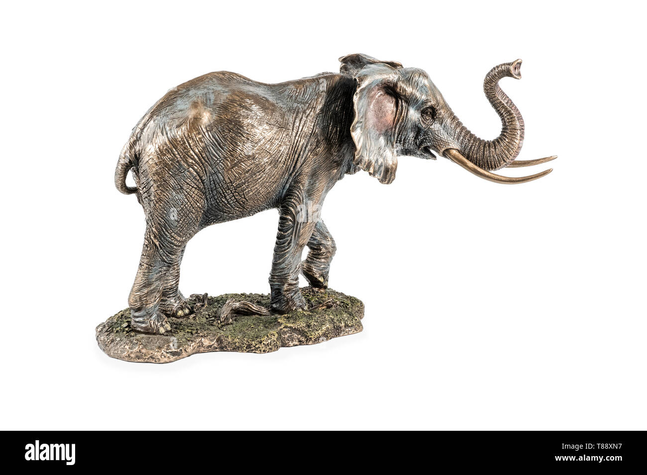bronze figurine of an elephant on a stand with a raised trunk isolated ...