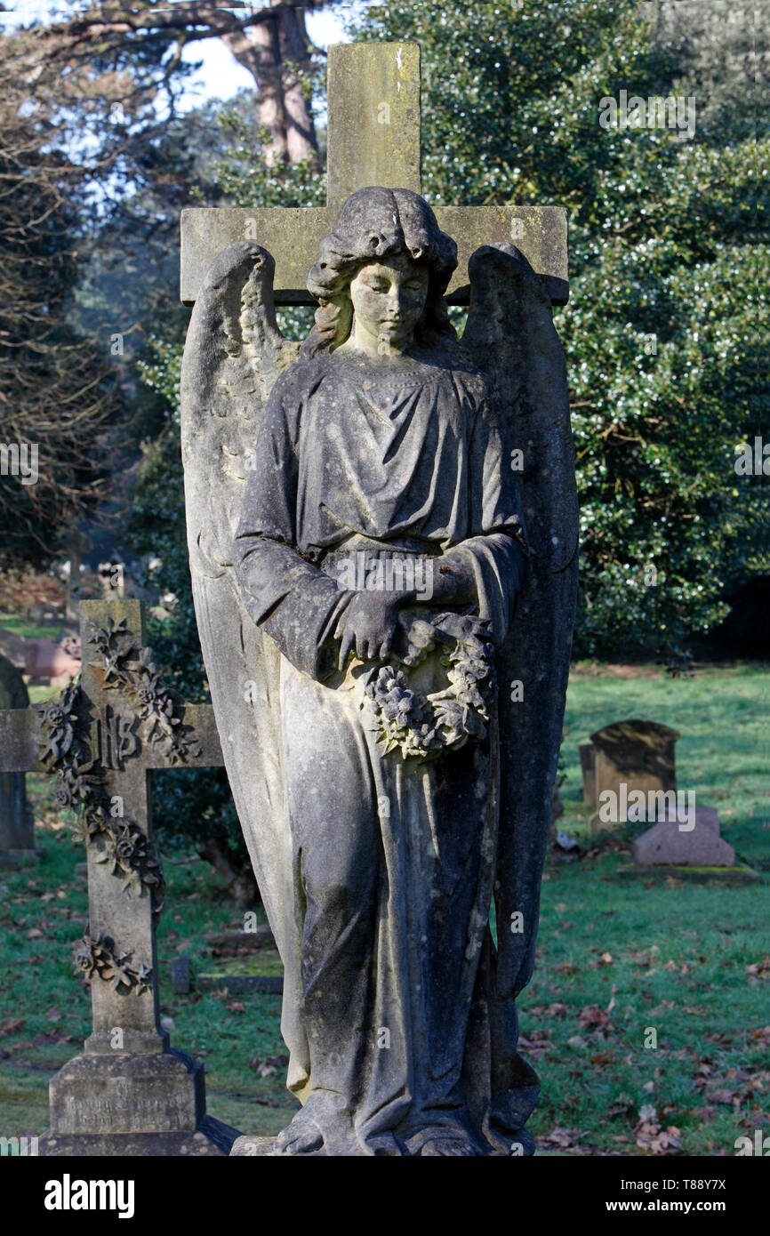Angel on a cross Stock Photo - Alamy