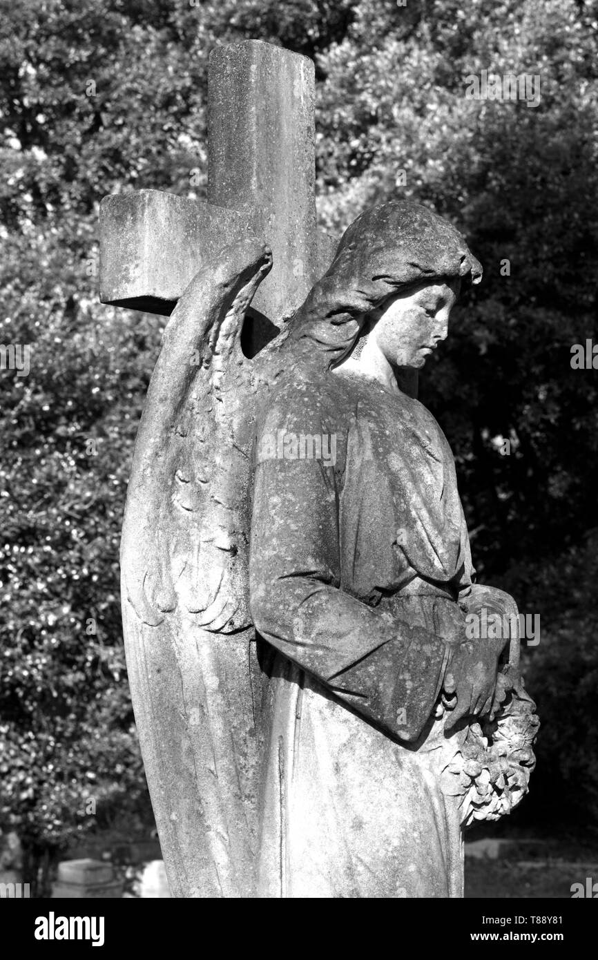 Angel on a cross Stock Photo - Alamy