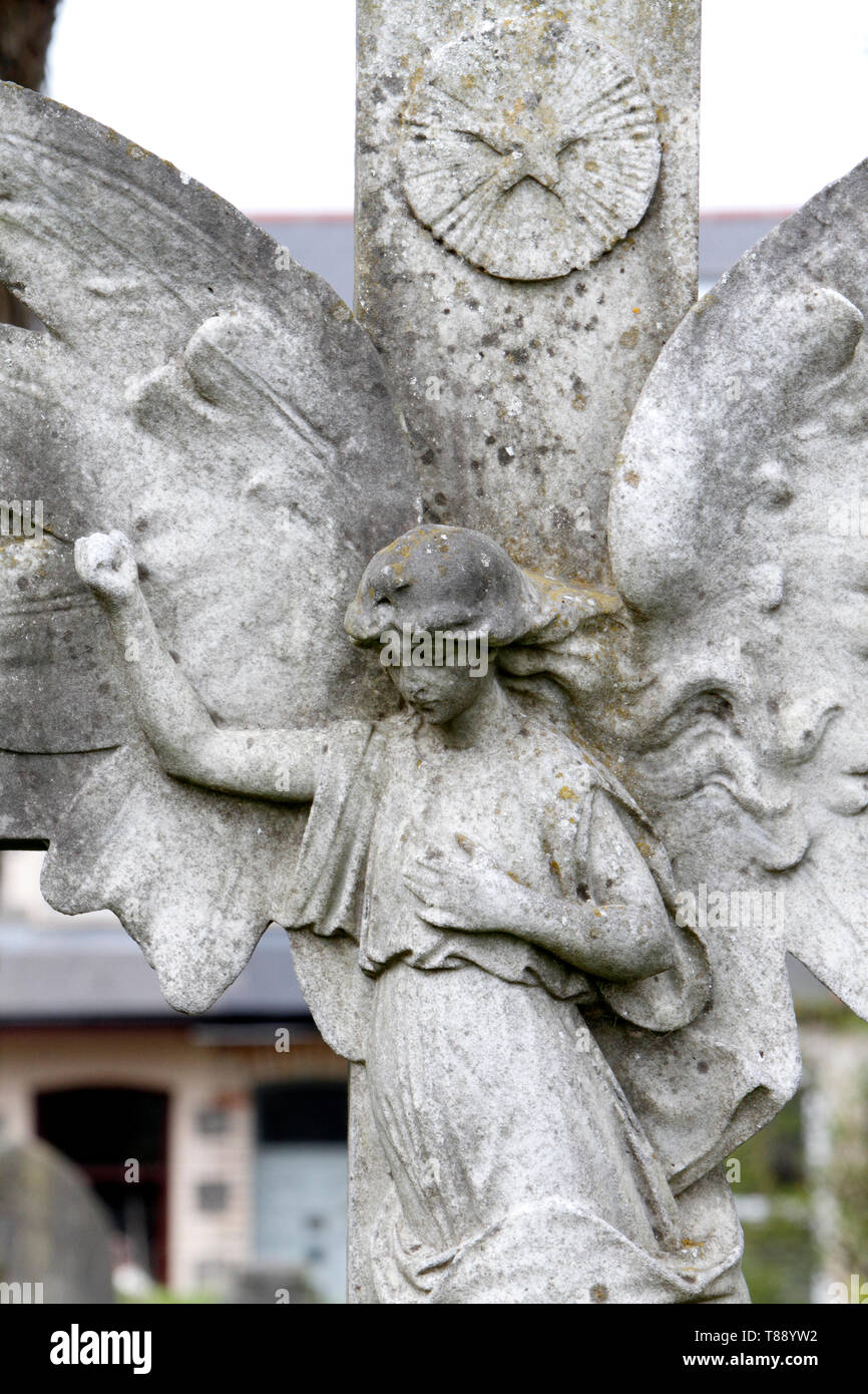 winged angel on a cross Stock Photo - Alamy