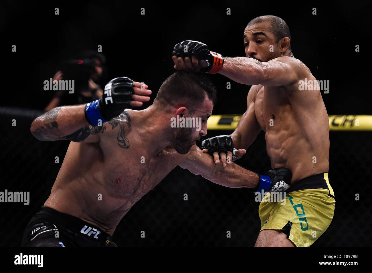 UFC 237: NAMAJUNAS vs. ANDRADE - Fighters Jose Aldo (red glove) and ...