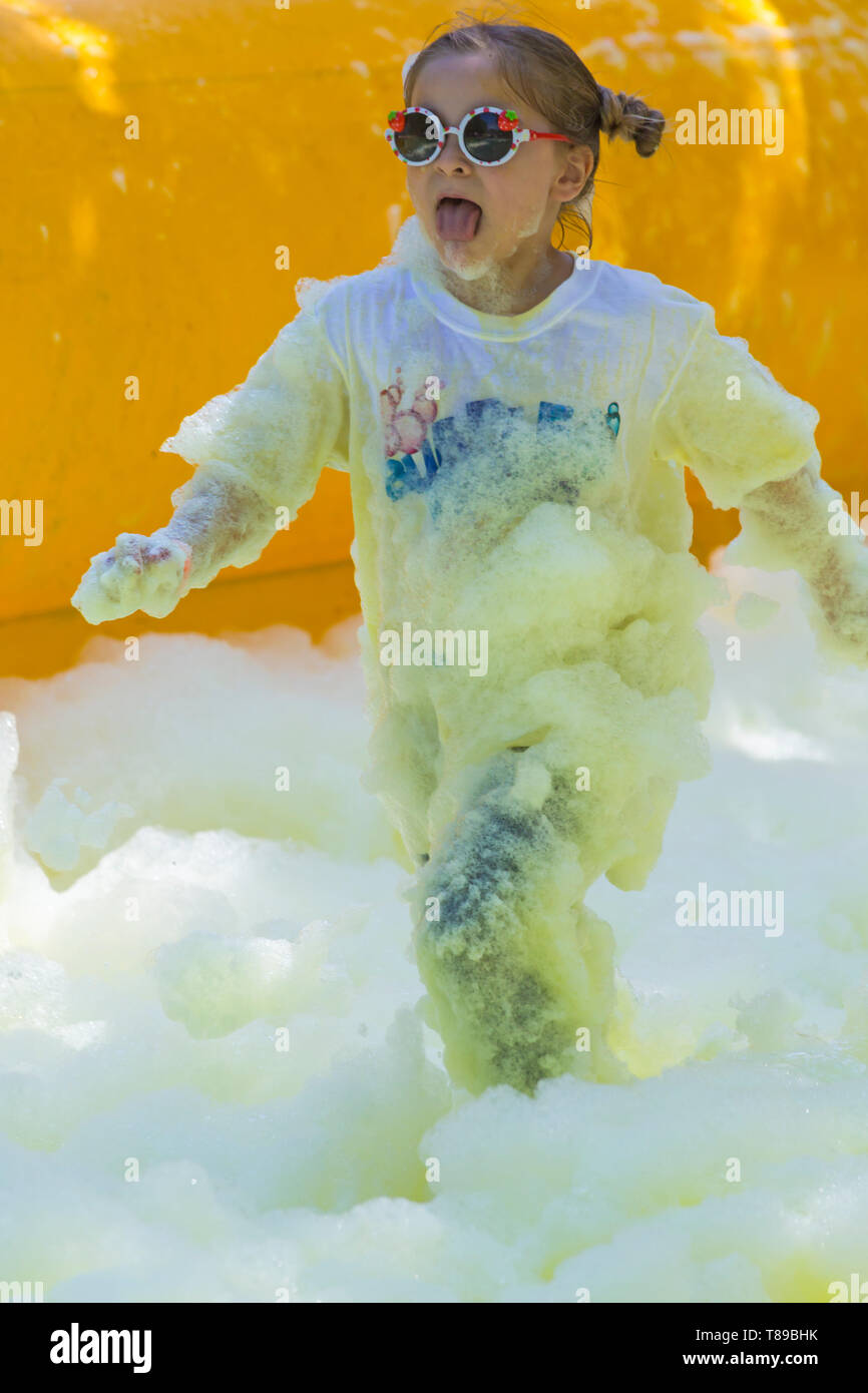 Girl covered in soap bubbles girls covered in soap bubbles hi-res stock ...