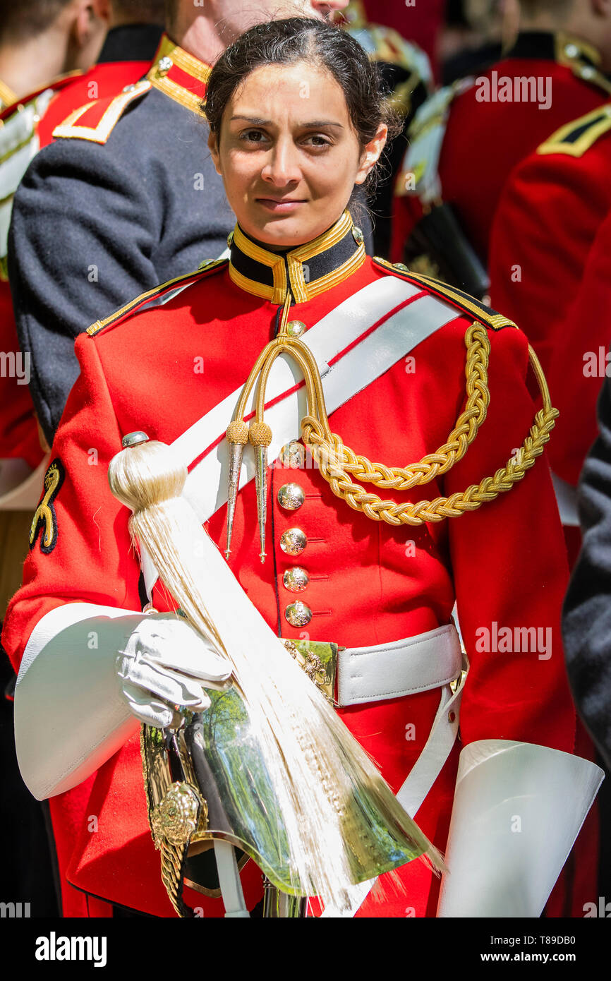 London, UK. 12th May, 2019. The march past, with a sole female trooper ...