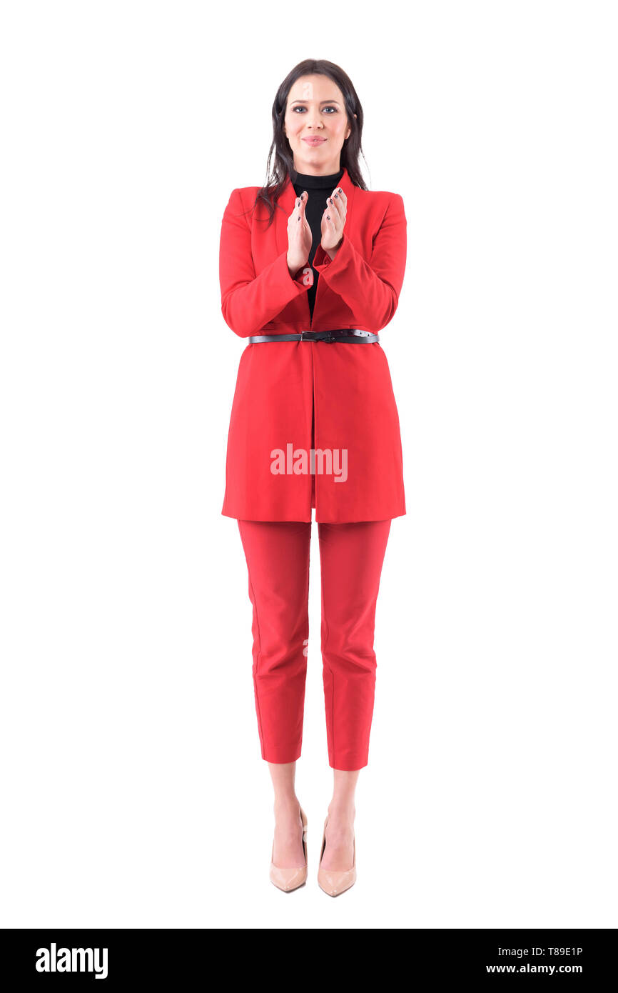 Young business woman in elegant red suit congratulating and applauding ...