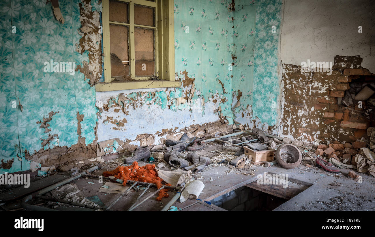 Old shoes in an abandoned little house in Belarus Chernobyl exclusion ...