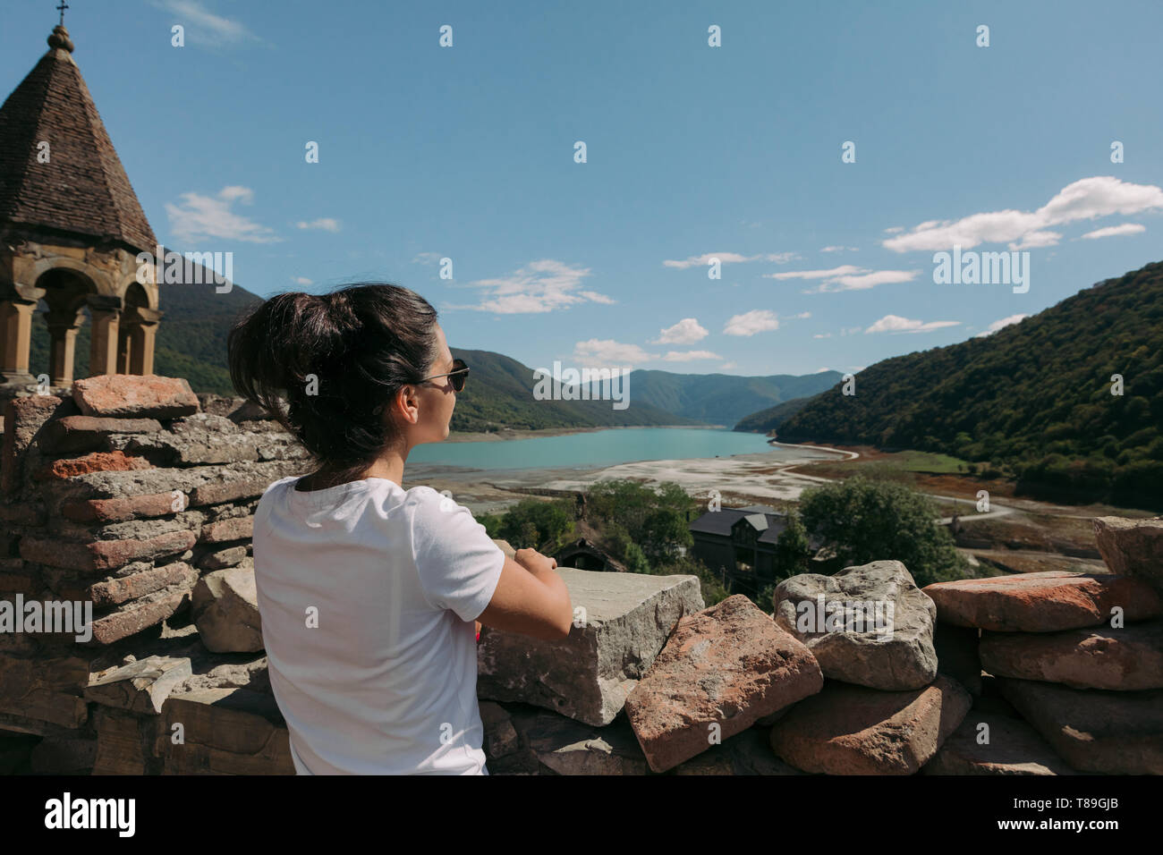 Young woman looks old fortress hi-res stock photography and images - Alamy