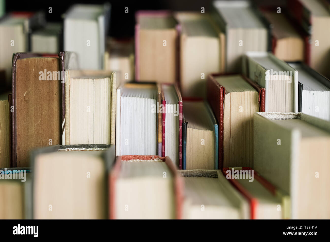 Stack of books background. many books piles. Stack of Books of ...