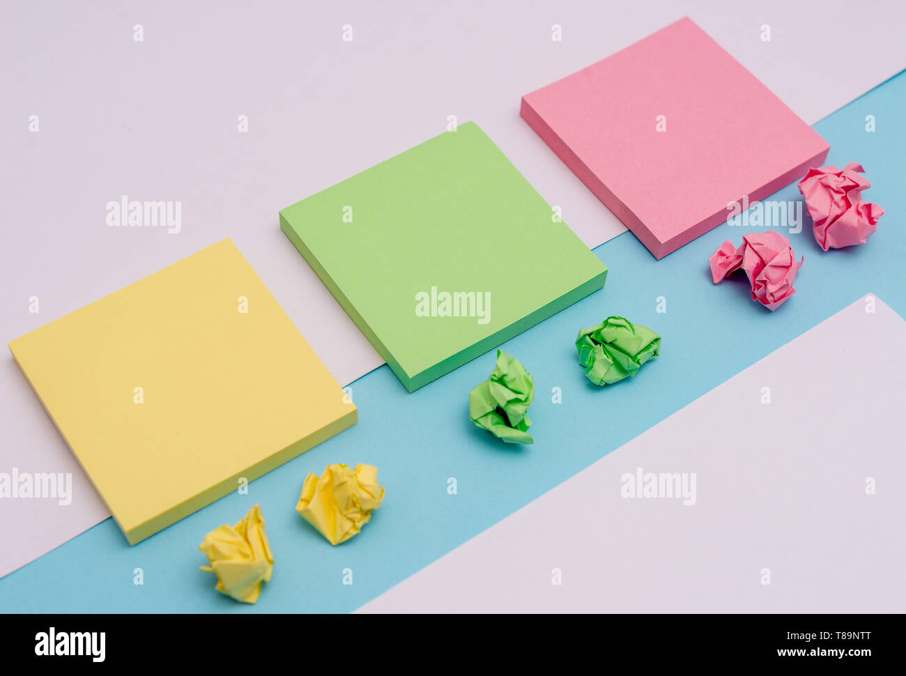 Note papers and stationary placed sideways on top of softhued backdrop ...