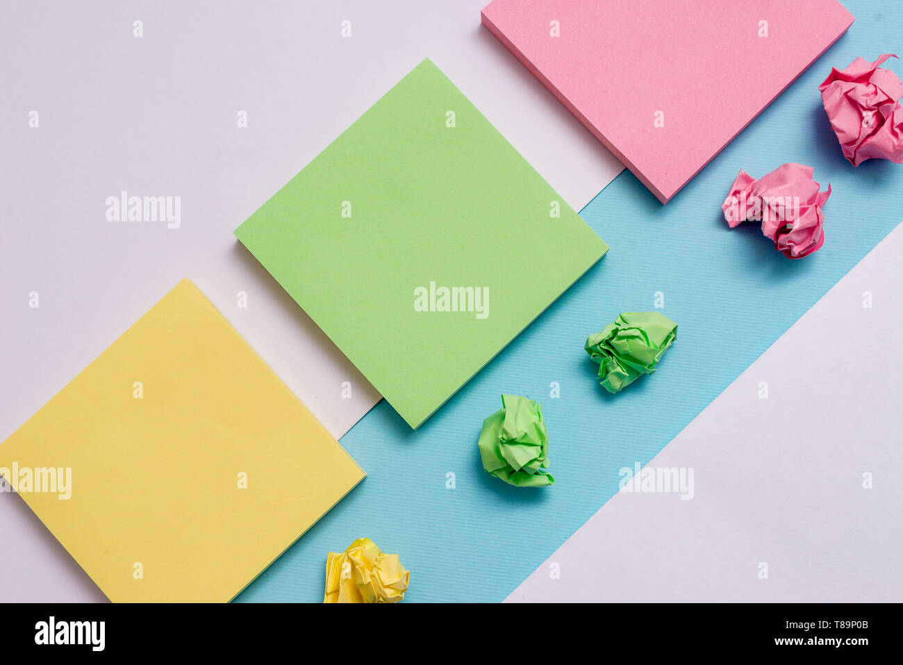 Note papers and stationary placed sideways on top of softhued backdrop ...