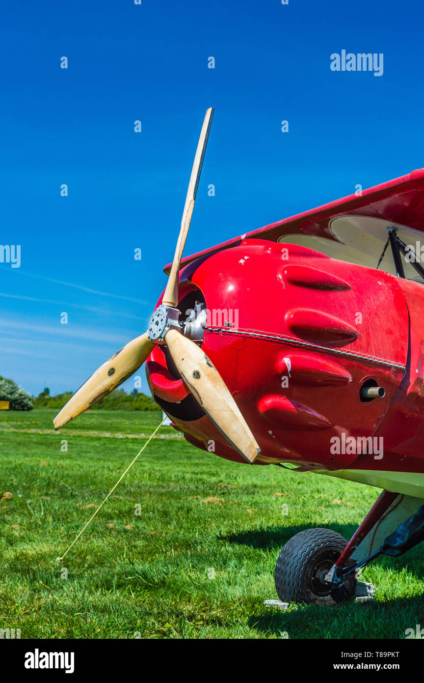 Propeller and nose of red vintage Murphy Renegade bi-plane at Delta ...