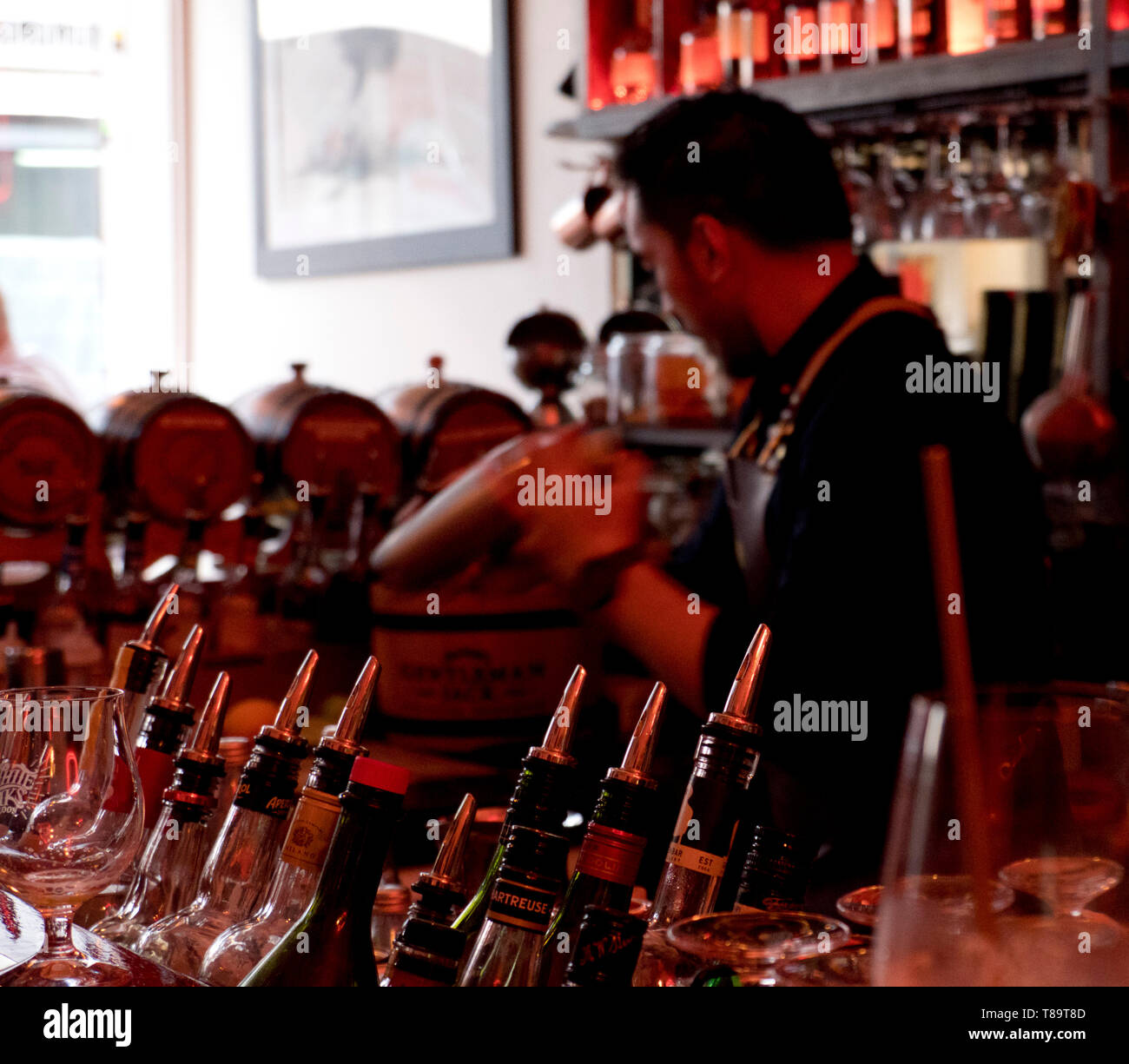 Barman shaking cocktail in bar hi-res stock photography and images - Alamy