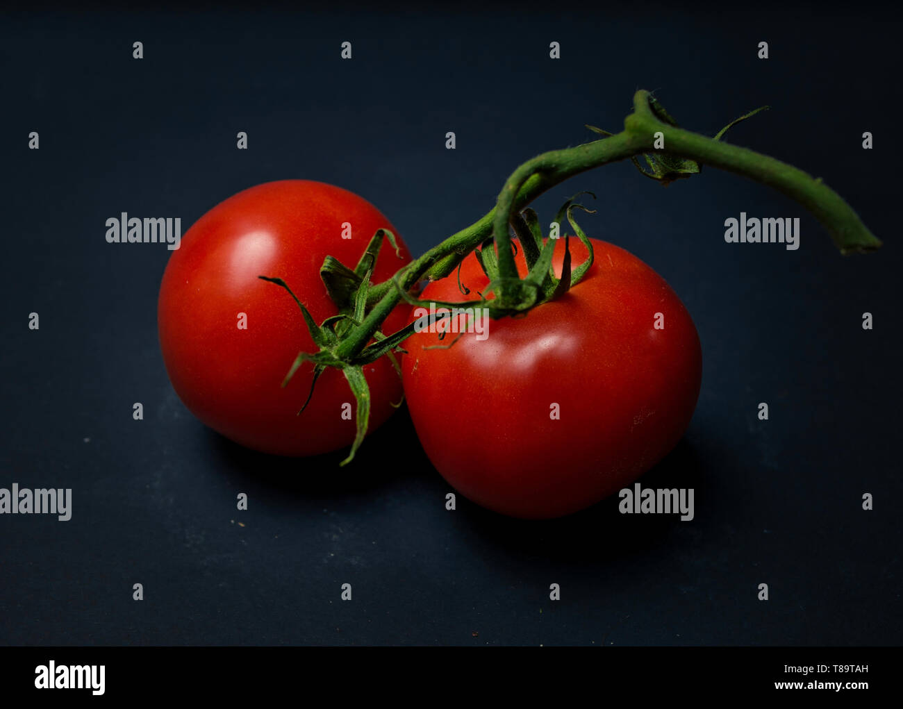 Two tomatoes hi-res stock photography and images - Alamy