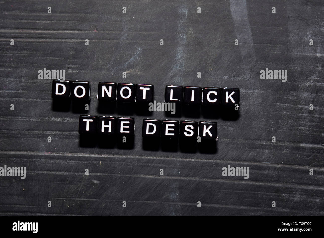 Don't lick the desk on wooden blocks. Education, Motivation and ...