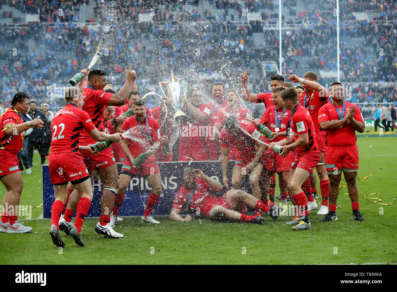 Saracens players celebrate winning the Champions Cup Final at St James ...