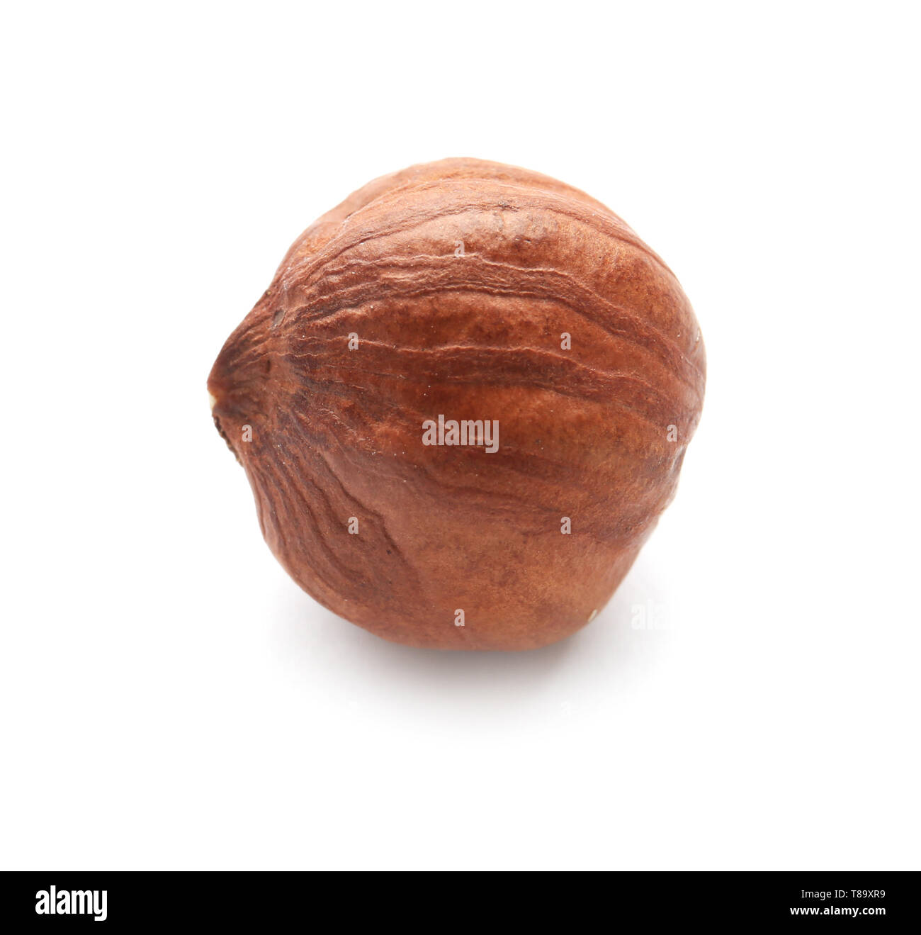 Tasty hazelnut on white background Stock Photo - Alamy