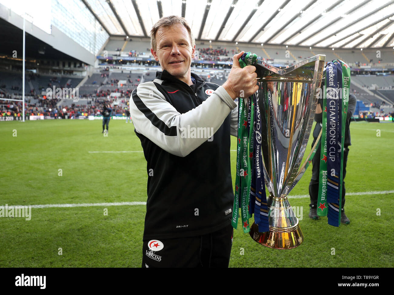 Saracens director Mark McCall celebrates with the trophy during the ...