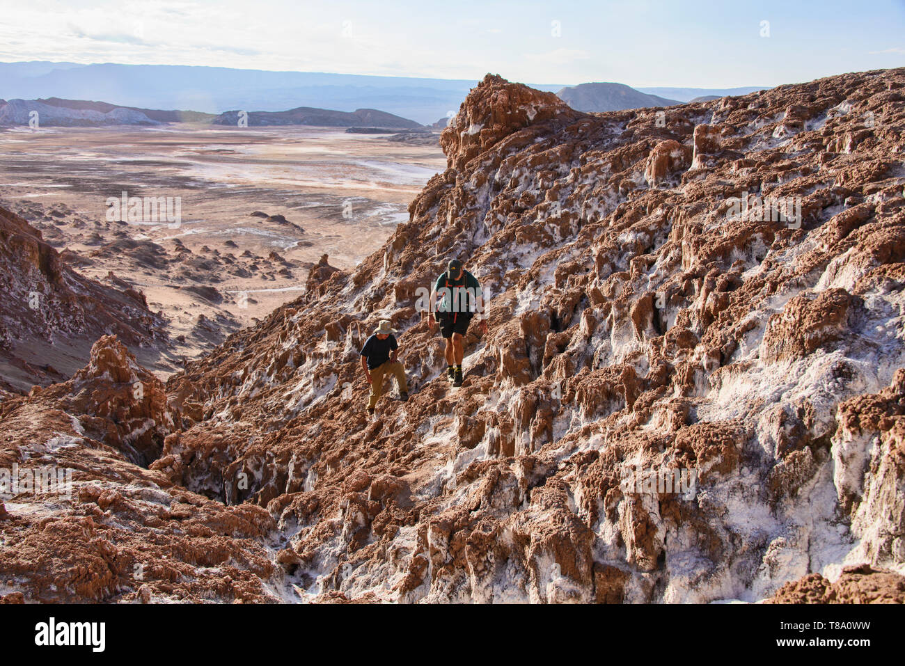 Tourist enjoying the salt, sand, and desertscape in the Moon Valley ...