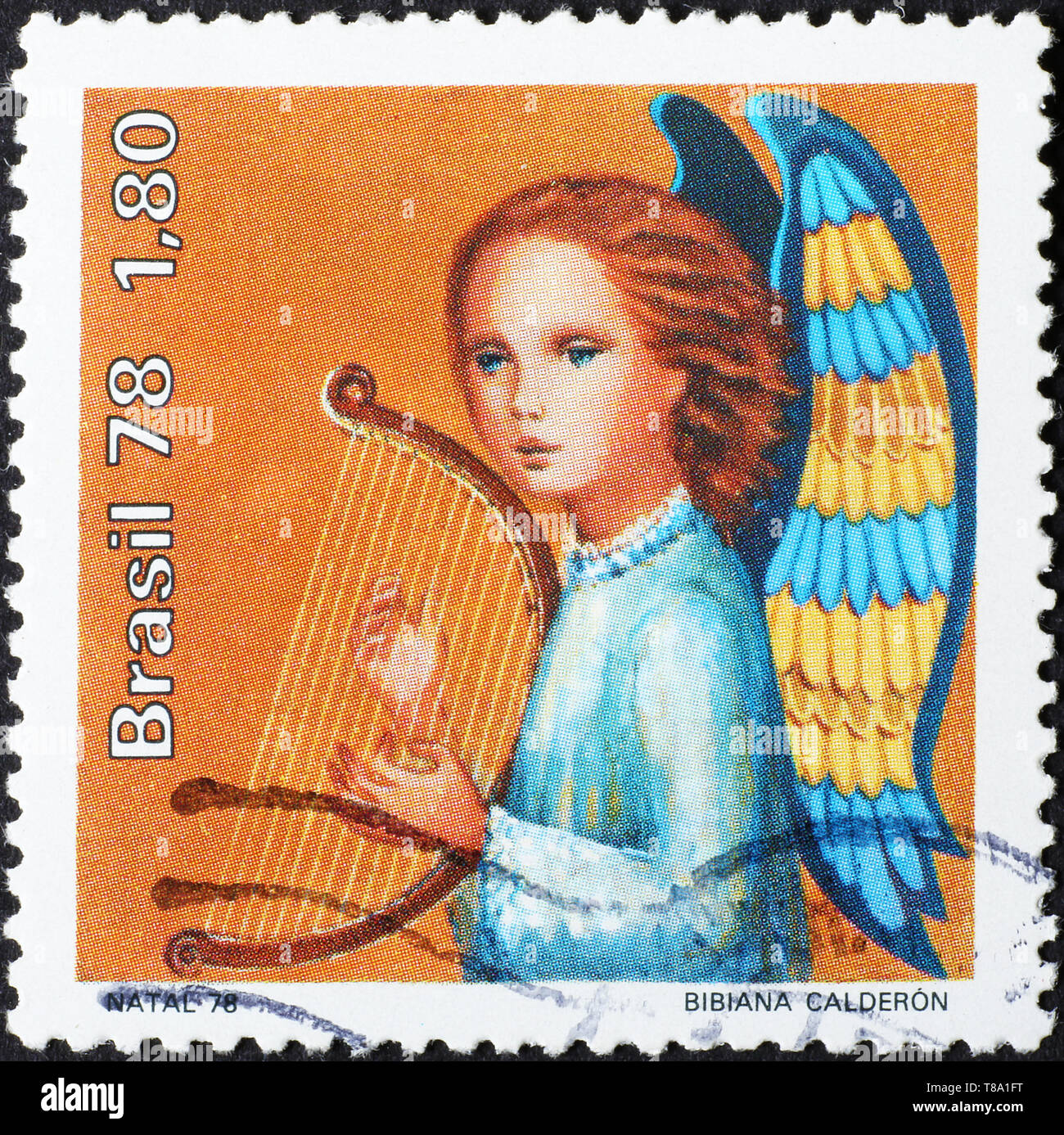 Angel playing harp on brazilian postage stamp Stock Photo - Alamy