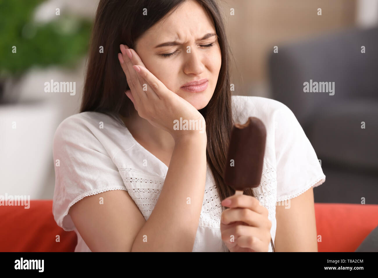 Woman ice cream sofa hi-res stock photography and images - Alamy